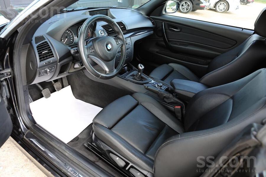 Black BMW 118 2011 in Tukums, with an engine capacity of 2.00 L and mileage of 220 thousand km for 6990 €, photo 11 on AUTOMOTO.COM.LV
