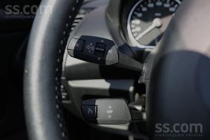 Black BMW 118 2011 in Tukums, with an engine capacity of 2.00 L and mileage of 220 thousand km for 6990 €, photo 18 on AUTOMOTO.COM.LV