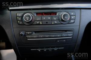 Black BMW 118 2011 in Tukums, with an engine capacity of 2.00 L and mileage of 220 thousand km for 6990 €, photo 26 on AUTOMOTO.COM.LV
