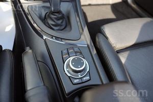 Black BMW 118 2011 in Tukums, with an engine capacity of 2.00 L and mileage of 220 thousand km for 6990 €, photo 29 on AUTOMOTO.COM.LV
