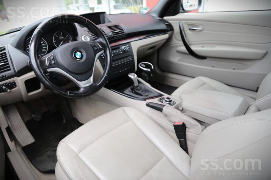 Black BMW 118 2013 in Riga, with an engine capacity of 2.00 L and mileage of 342 thousand km for 6995 €, photo 9 on AUTOMOTO.COM.LV