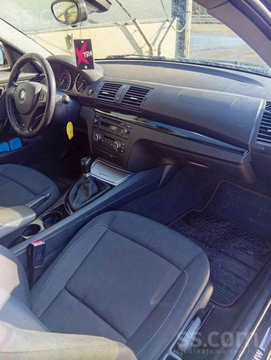 Black BMW 118 2008 in Saldus, with an engine capacity of 2.00 L and mileage of 326 thousand km for 2200 €, photo 8 on AUTOMOTO.COM.LV