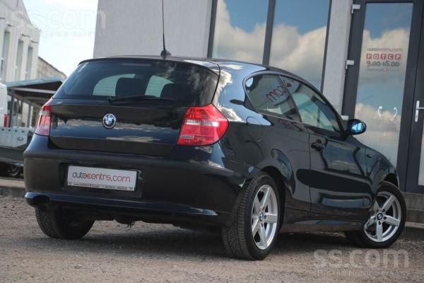 Black BMW 118 2009 in Tukums, with an engine capacity of 2.00 L and mileage of 208 thousand km for 4996 €, photo 5 on AUTOMOTO.COM.LV