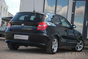 Black BMW 118 2009 in Tukums, with an engine capacity of 2.00 L and mileage of 208 thousand km for 4996 €, photo 6 on AUTOMOTO.COM.LV