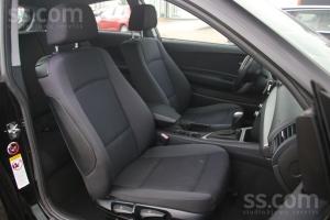 Black BMW 118 2009 in Tukums, with an engine capacity of 2.00 L and mileage of 208 thousand km for 4996 €, photo 13 on AUTOMOTO.COM.LV