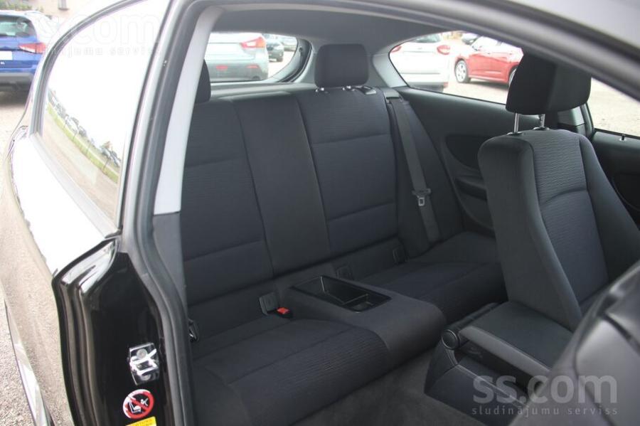 Black BMW 118 2009 in Tukums, with an engine capacity of 2.00 L and mileage of 208 thousand km for 4996 €, photo 14 on AUTOMOTO.COM.LV