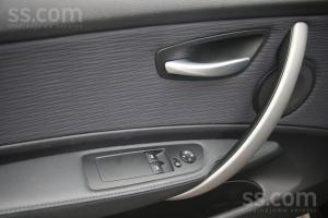 Black BMW 118 2009 in Tukums, with an engine capacity of 2.00 L and mileage of 208 thousand km for 4996 €, photo 20 on AUTOMOTO.COM.LV