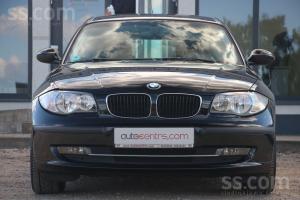 Black BMW 118 2009 in Tukums, with an engine capacity of 2.00 L and mileage of 208 thousand km for 4996 €, photo 30 on AUTOMOTO.COM.LV