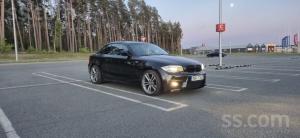 Melns BMW 118 2011 Rīga, ar dzinēja tilpumu 2.00 L un nobraukumu 296 tūkst. km par 6500 €, foto  vietnē AUTOMOTO.COM.LV