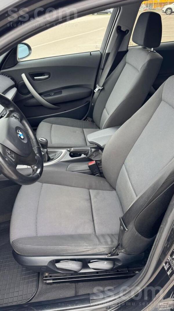 Black BMW 118 2006 in Riga, with an engine capacity of 2.00 L and mileage of 311 thousand km for 2450 €, photo 7 on AUTOMOTO.COM.LV
