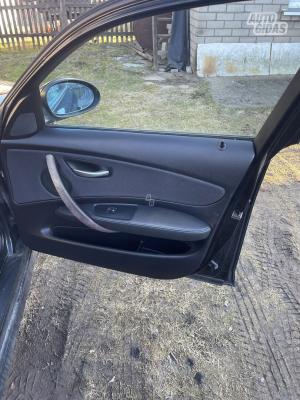 Black BMW 118 2007 in Silute, with an engine capacity of 2.00 L and mileage of 232 thousand km for 3270 €, photo 7 on AUTOMOTO.COM.LV