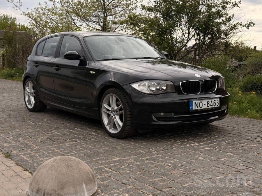 Black BMW 118 2007 in Riga, with an engine capacity of 2.00 L and mileage of 209 thousand km for 3700 €, photo 1 on AUTOMOTO.COM.LV