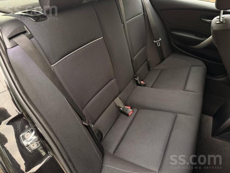 Black BMW 118 2007 in Riga, with an engine capacity of 2.00 L and mileage of 209 thousand km for 3700 €, photo 10 on AUTOMOTO.COM.LV