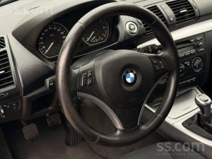 Black BMW 118 2007 in Riga, with an engine capacity of 2.00 L and mileage of 209 thousand km for 3700 €, photo 11 on AUTOMOTO.COM.LV