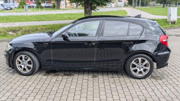 Black BMW 118 2007 in Riga, with an engine capacity of 2.00 L and mileage of 204 thousand km for 3800 €, photo 3 on AUTOMOTO.COM.LV
