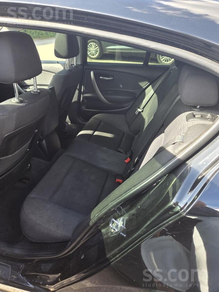 Black BMW 118 2007 in Ogre, with an engine capacity of 2.00 L and mileage of 354 thousand km for 3200 €, photo 7 on AUTOMOTO.COM.LV