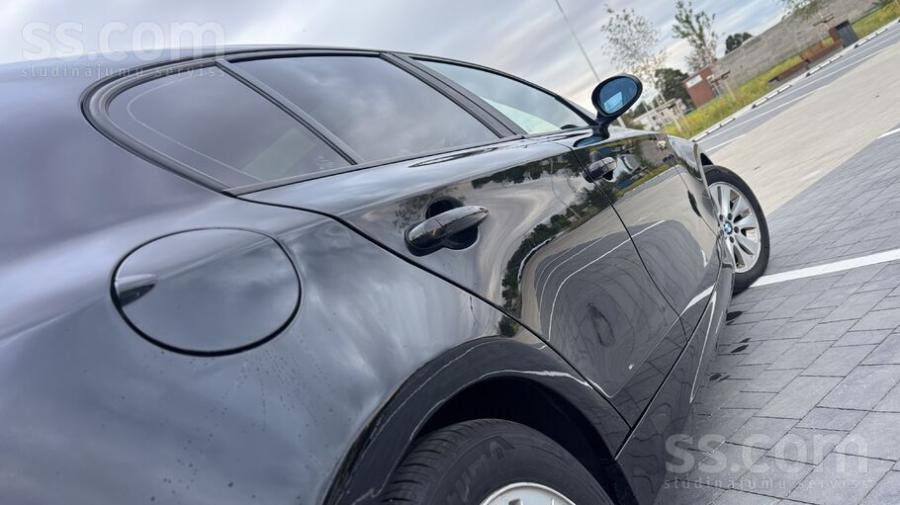 Black BMW 118 2007 in Riga, with an engine capacity of 2.00 L and mileage of 350 thousand km for 2990 €, photo 10 on AUTOMOTO.COM.LV