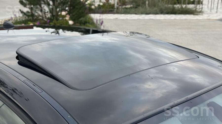 Black BMW 118 2007 in Riga, with an engine capacity of 2.00 L and mileage of 350 thousand km for 2990 €, photo 12 on AUTOMOTO.COM.LV