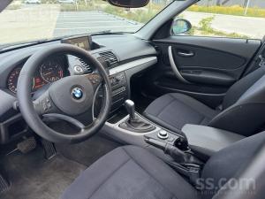 Black BMW 118 2007 in Riga, with an engine capacity of 2.00 L and mileage of 350 thousand km for 2990 €, photo 14 on AUTOMOTO.COM.LV