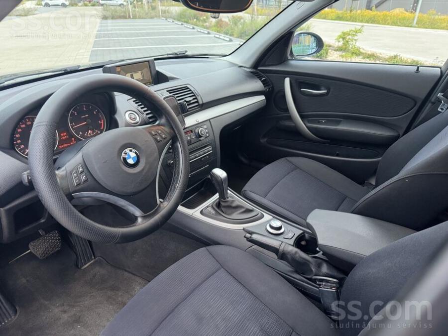 Black BMW 118 2007 in Riga, with an engine capacity of 2.00 L and mileage of 350 thousand km for 2990 €, photo 14 on AUTOMOTO.COM.LV