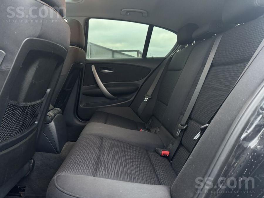 Black BMW 118 2007 in Riga, with an engine capacity of 2.00 L and mileage of 350 thousand km for 2990 €, photo 19 on AUTOMOTO.COM.LV