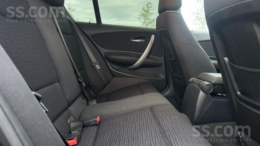 Black BMW 118 2007 in Riga, with an engine capacity of 2.00 L and mileage of 350 thousand km for 2990 €, photo 20 on AUTOMOTO.COM.LV