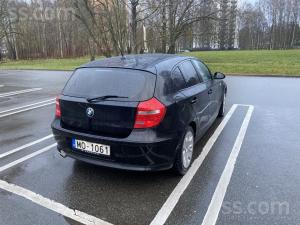 Black BMW 118 2008 in Riga, with an engine capacity of 2.00 L and mileage of 302 thousand km for 4600 €, photo 6 on AUTOMOTO.COM.LV