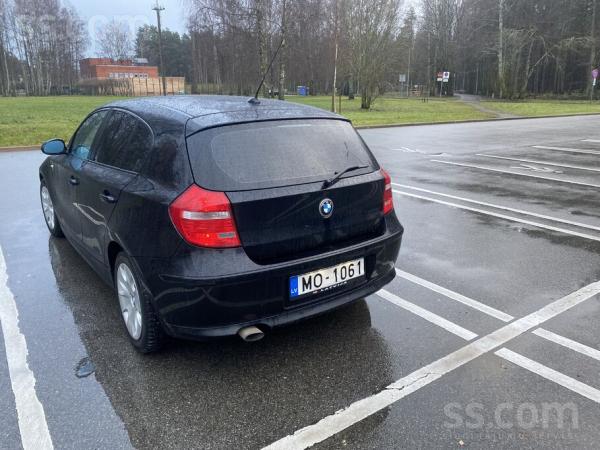 Black BMW 118 2008 in Riga, with an engine capacity of 2.00 L and mileage of 302 thousand km for 4600 €, photo 7 on AUTOMOTO.COM.LV
