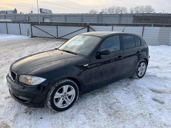 Black BMW 118 2008 in Panevezys, with an engine capacity of 2.00 L and mileage of 187 thousand km for 2800 €, photo 1 on AUTOMOTO.COM.LV