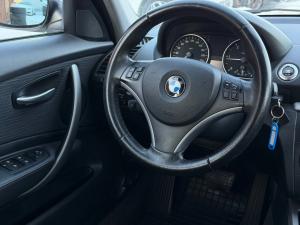 Black BMW 118 2008 in Riga, with an engine capacity of 2.00 L and mileage of 298 thousand km for 3780 €, photo 14 on AUTOMOTO.COM.LV
