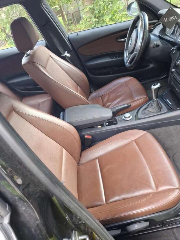 Black BMW 118 2008 in Siauliai, with an engine capacity of 2.00 L and mileage of 170 thousand km for 2950 €, photo 3 on AUTOMOTO.COM.LV