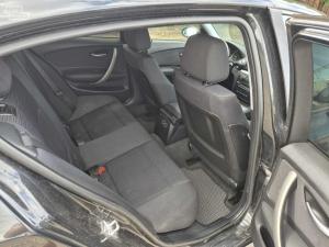 Black BMW 118 2008 in Siauliai, with an engine capacity of 2.00 L and mileage of 278 thousand km for 2300 €, photo 11 on AUTOMOTO.COM.LV