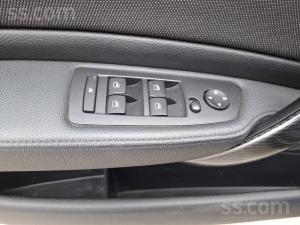 Black BMW 118 2008 in Talsi, with an engine capacity of 2.00 L and mileage of 261 thousand km for 3900 €, photo 26 on AUTOMOTO.COM.LV