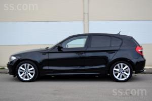 Black BMW 118 2009 in Tukums, with an engine capacity of 2.00 L and mileage of 266 thousand km for 6290 €, photo 11 on AUTOMOTO.COM.LV