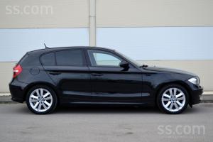 Black BMW 118 2009 in Tukums, with an engine capacity of 2.00 L and mileage of 266 thousand km for 6290 €, photo 12 on AUTOMOTO.COM.LV