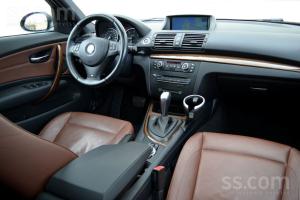 Black BMW 118 2009 in Tukums, with an engine capacity of 2.00 L and mileage of 266 thousand km for 6290 €, photo 13 on AUTOMOTO.COM.LV