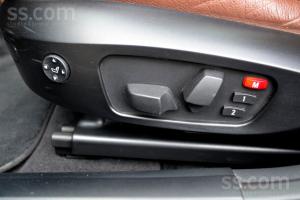 Black BMW 118 2009 in Tukums, with an engine capacity of 2.00 L and mileage of 266 thousand km for 6290 €, photo 28 on AUTOMOTO.COM.LV