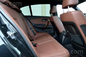 Black BMW 118 2009 in Tukums, with an engine capacity of 2.00 L and mileage of 266 thousand km for 6290 €, photo 30 on AUTOMOTO.COM.LV
