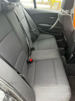 Black BMW 118 2009 in Riga, with an engine capacity of 2.00 L and mileage of 272 thousand km for 4200 €, photo 7 on AUTOMOTO.COM.LV