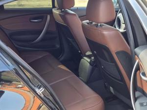 Black BMW 118 2009 in Grobiņa, with an engine capacity of 2.00 L and mileage of 272 thousand km for 4690 €, photo 13 on AUTOMOTO.COM.LV
