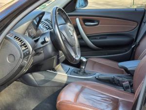 Black BMW 118 2009 in Grobiņa, with an engine capacity of 2.00 L and mileage of 272 thousand km for 4690 €, photo 14 on AUTOMOTO.COM.LV