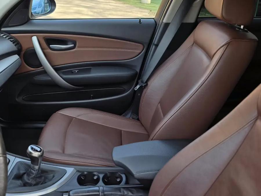 Black BMW 118 2009 in Grobiņa, with an engine capacity of 2.00 L and mileage of 272 thousand km for 4690 €, photo 19 on AUTOMOTO.COM.LV