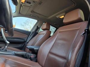 Black BMW 118 2009 in Grobiņa, with an engine capacity of 2.00 L and mileage of 272 thousand km for 4690 €, photo 23 on AUTOMOTO.COM.LV
