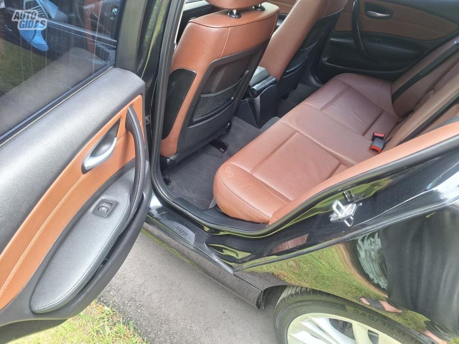 Black BMW 118 2009 in Utena, with an engine capacity of 2.00 L and mileage of 295 thousand km for 4500 €, photo 8 on AUTOMOTO.COM.LV