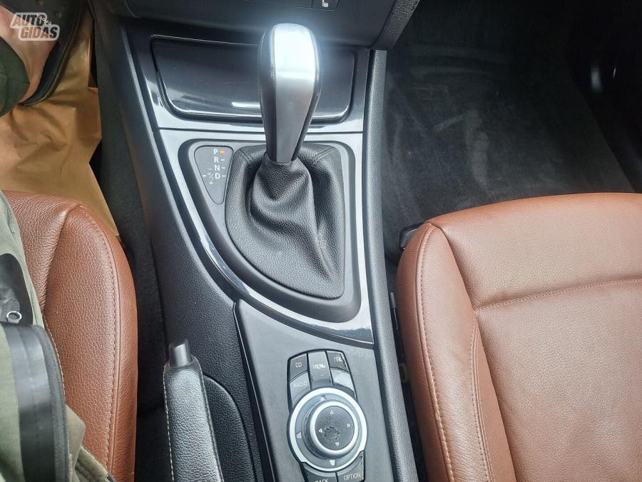 Black BMW 118 2009 in Utena, with an engine capacity of 2.00 L and mileage of 295 thousand km for 4500 €, photo 12 on AUTOMOTO.COM.LV