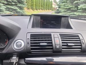 Black BMW 118 2009 in Utena, with an engine capacity of 2.00 L and mileage of 295 thousand km for 4500 €, photo 14 on AUTOMOTO.COM.LV