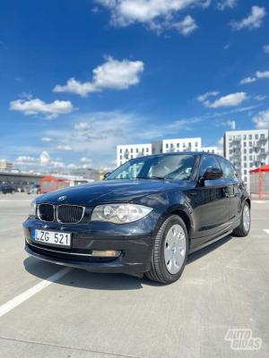 Black BMW 118 2009 in Vilnius, with an engine capacity of 2.00 L and mileage of 319 thousand km for 3690 €, photo  on AUTOMOTO.COM.LV