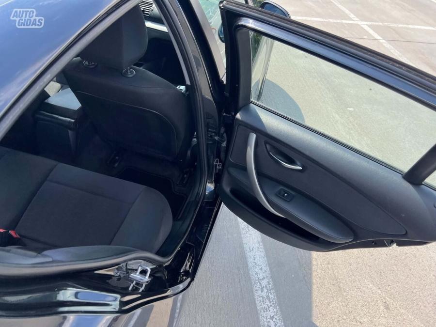 Black BMW 118 2009 in Vilnius, with an engine capacity of 2.00 L and mileage of 319 thousand km for 3690 €, photo 11 on AUTOMOTO.COM.LV