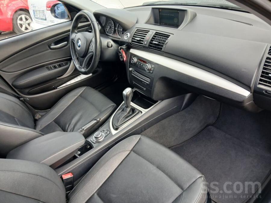 Black BMW 118 2009 in Riga, with an engine capacity of 2.00 L and mileage of 0 thousand km for 5350 €, photo 8 on AUTOMOTO.COM.LV