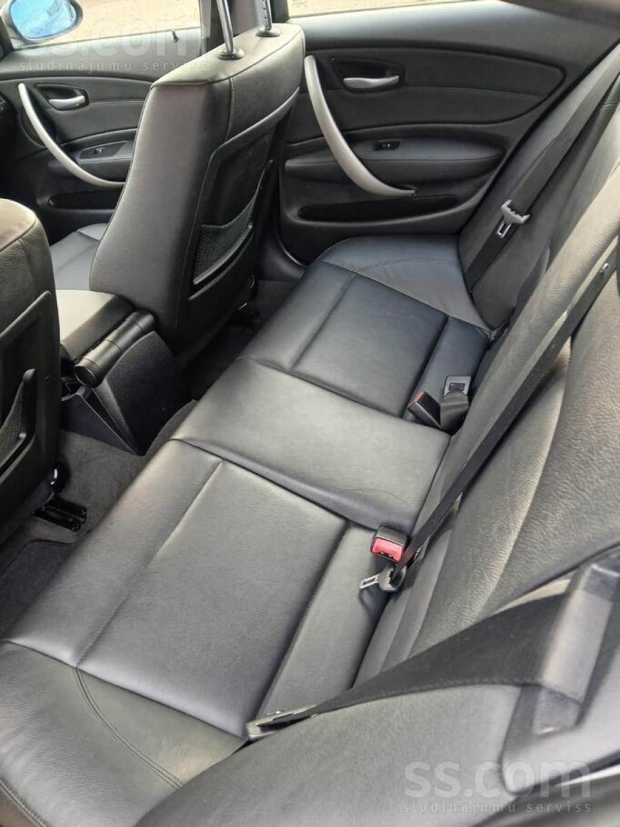 Black BMW 118 2009 in Riga, with an engine capacity of 2.00 L and mileage of 0 thousand km for 5350 €, photo 10 on AUTOMOTO.COM.LV